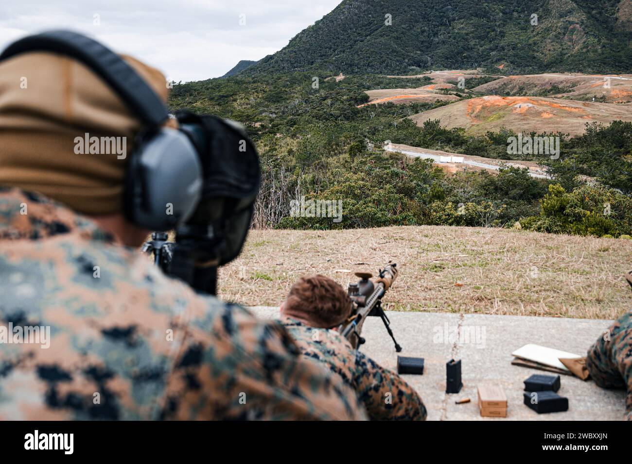 U.S. Marines with 3rd Reconnaissance Battalion, 3d Marine Divison, fire ...