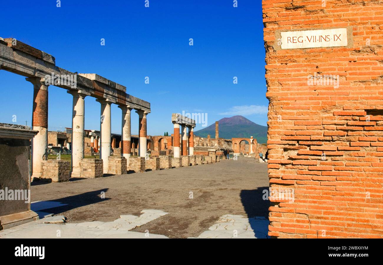 ruins of Pompei or Pompeii with Vesuv in background with street sign in ...