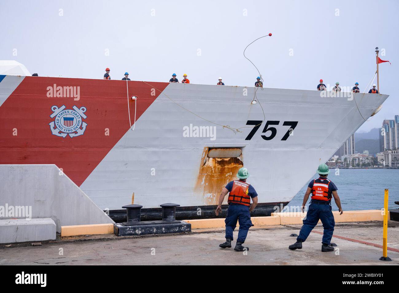Line handlers prepare to catch the heaving line to assist with the ...