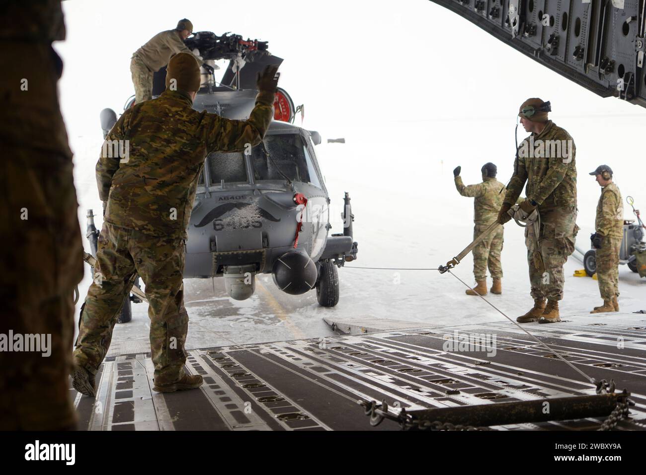 Airmen from the 176th and 718th Aircraft Maintenance Squadrons prepare ...