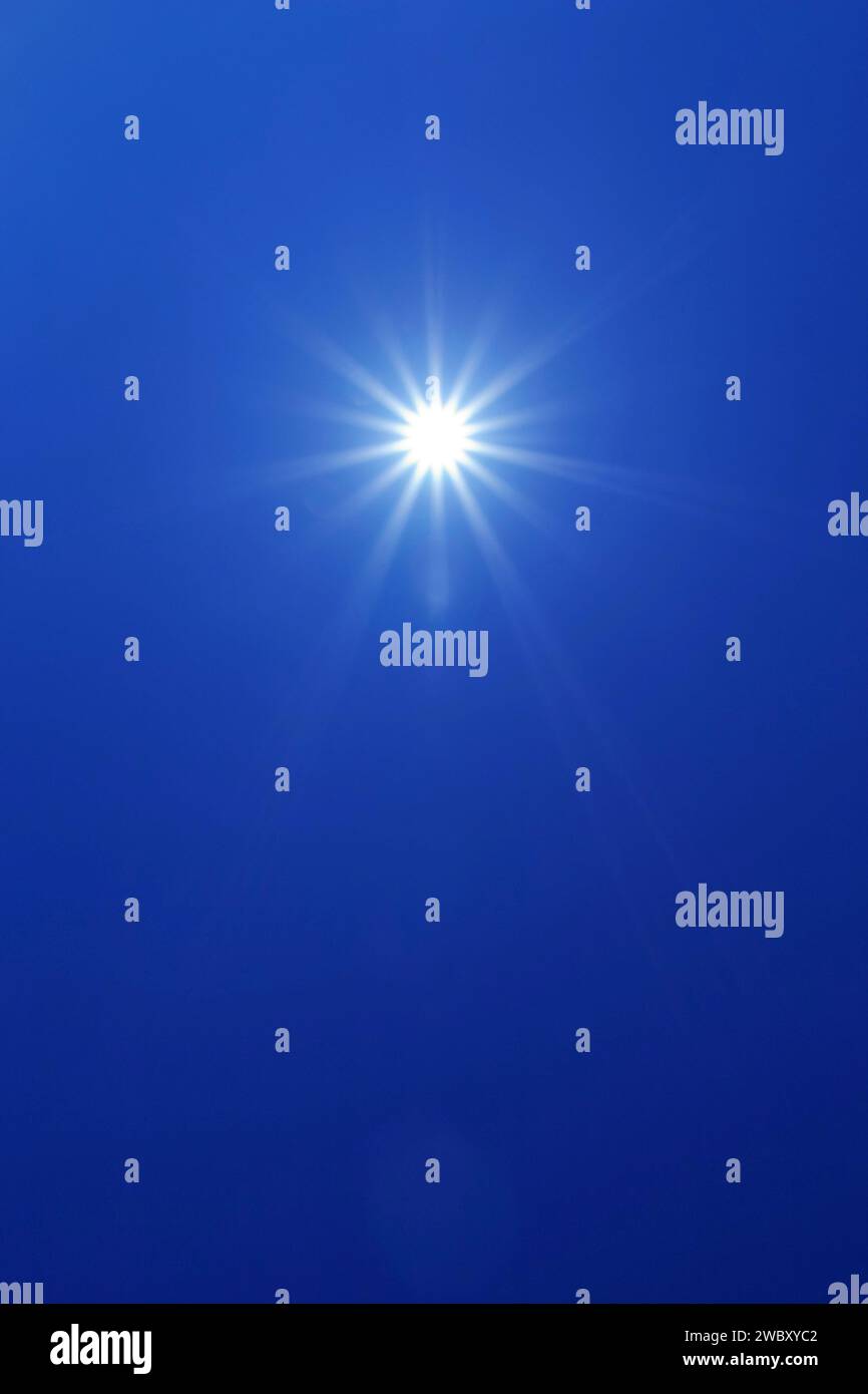 sun in blue sky Stock Photo - Alamy