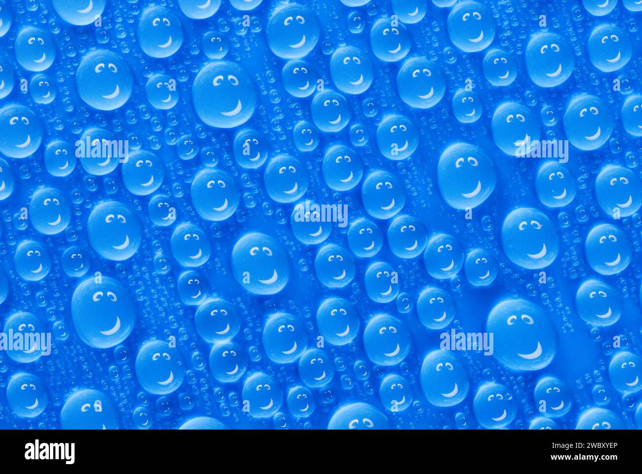 closeup, macro of many water drops, droplets, on a blue surface ...