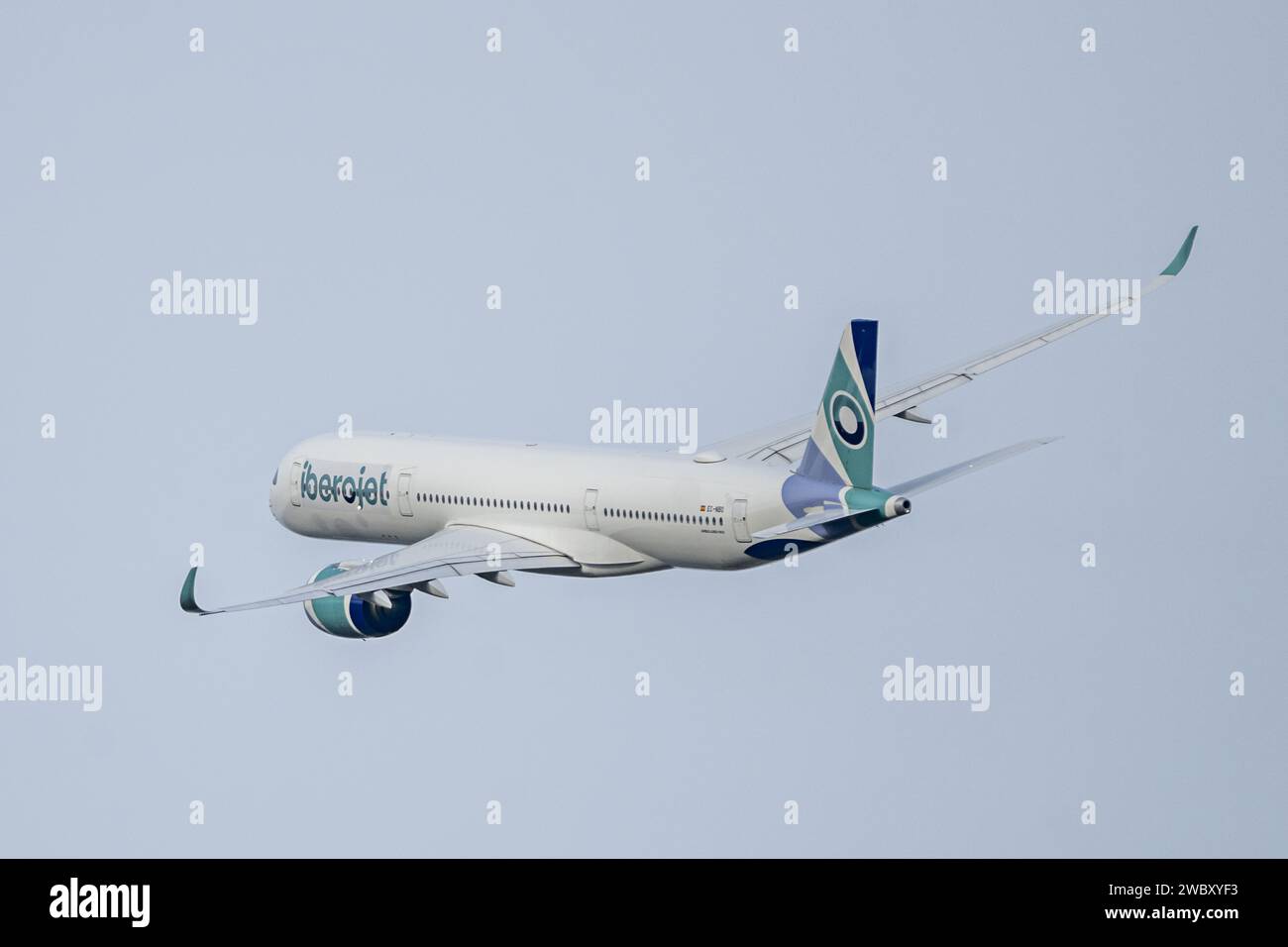 A plane turning in the sky to head towards its destination Stock Photo ...