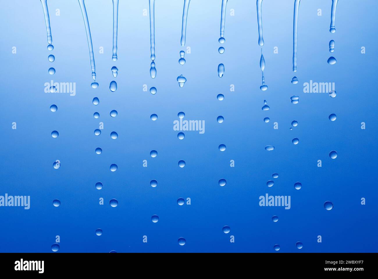 Water drops falling running down hi-res stock photography and images ...