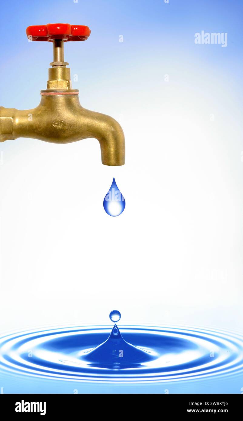 closeup of a golden brass water tap with red handle, water drop ...