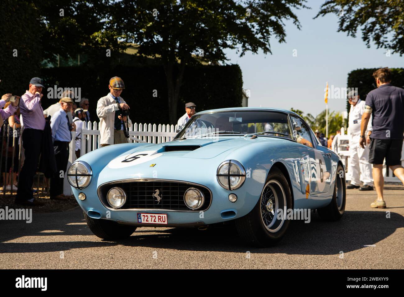Light blue Ferrari 250 GT SWB/C entering the paddock at the Goodwood ...