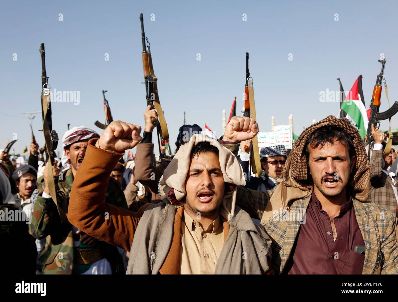 Sanaa, Yemen. 12th Jan, 2024. Yemenis participate in a rally in Sanaa ...