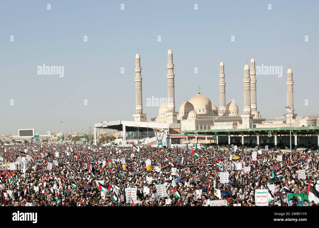 Sanaa, Yemen. 12th Jan, 2024. Yemenis participate in a rally in Sanaa ...