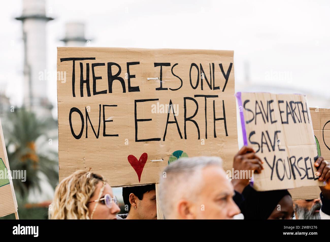 Group of diverse activist people protesting against climate change ...