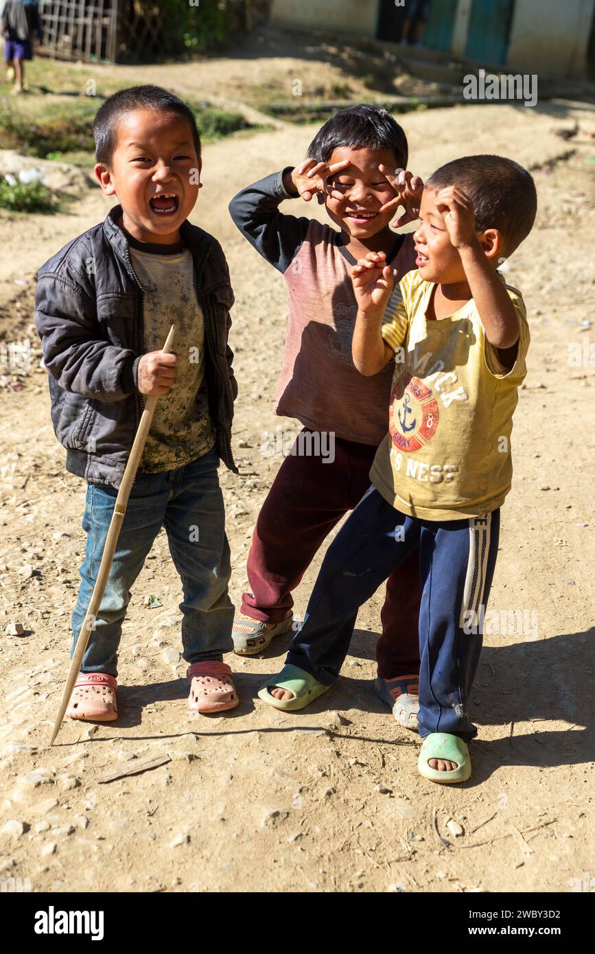 Three kids playing, Lazu Village, Arunachal Pradesh, India Stock Photo ...