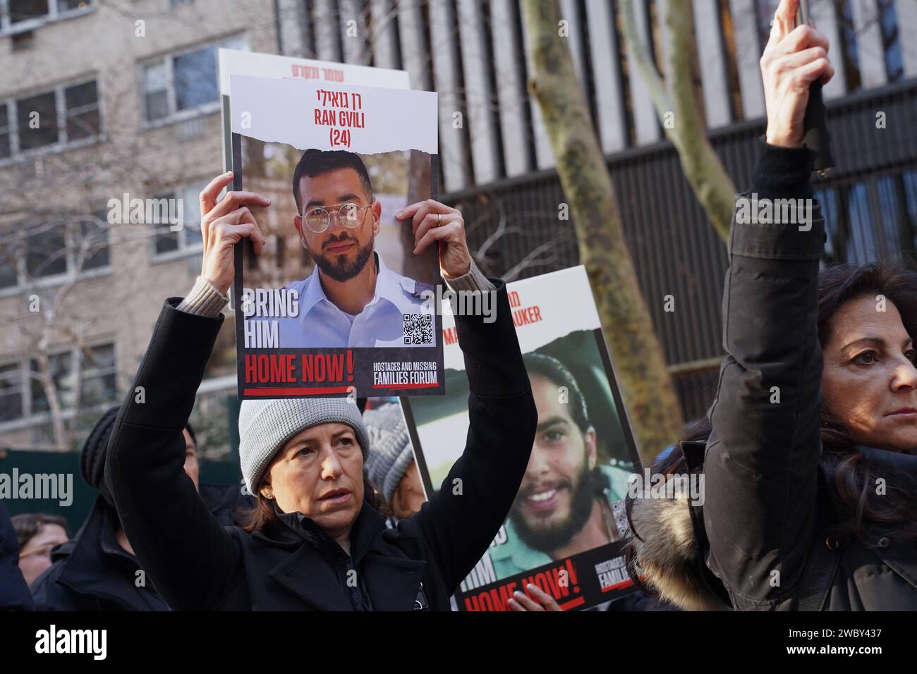 Manhattan, United States. 12th Jan, 2024. A woman holds a poster with ...