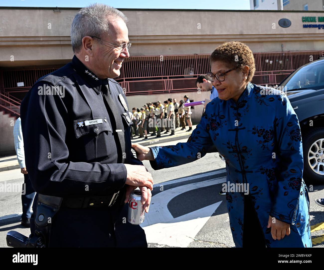 FILE - Los Angeles police chief Michael Moore, left, speaks with Los Angeles Mayor Karen Bass ...