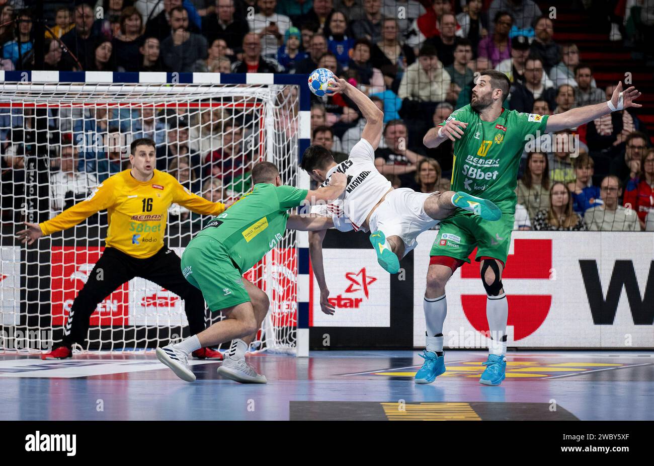 Muenchen, Deutschland. 12th Jan, 2024. Vuk Lazovic (Montenegro, #8) und Vuko Borozan (Montenegro ...