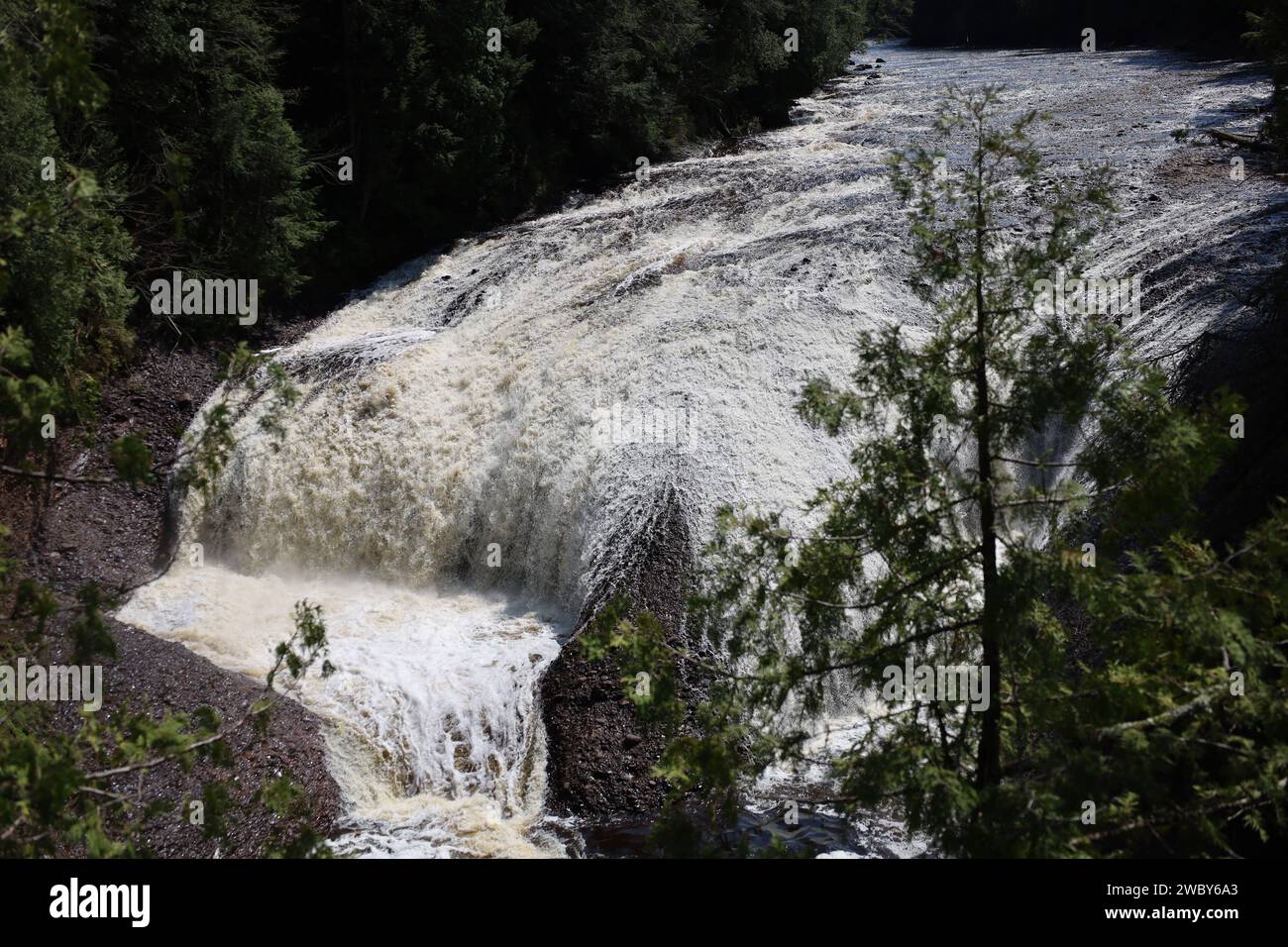 Beautiful flowing Waterfall in the spring of Northern Upper Peninsula ...
