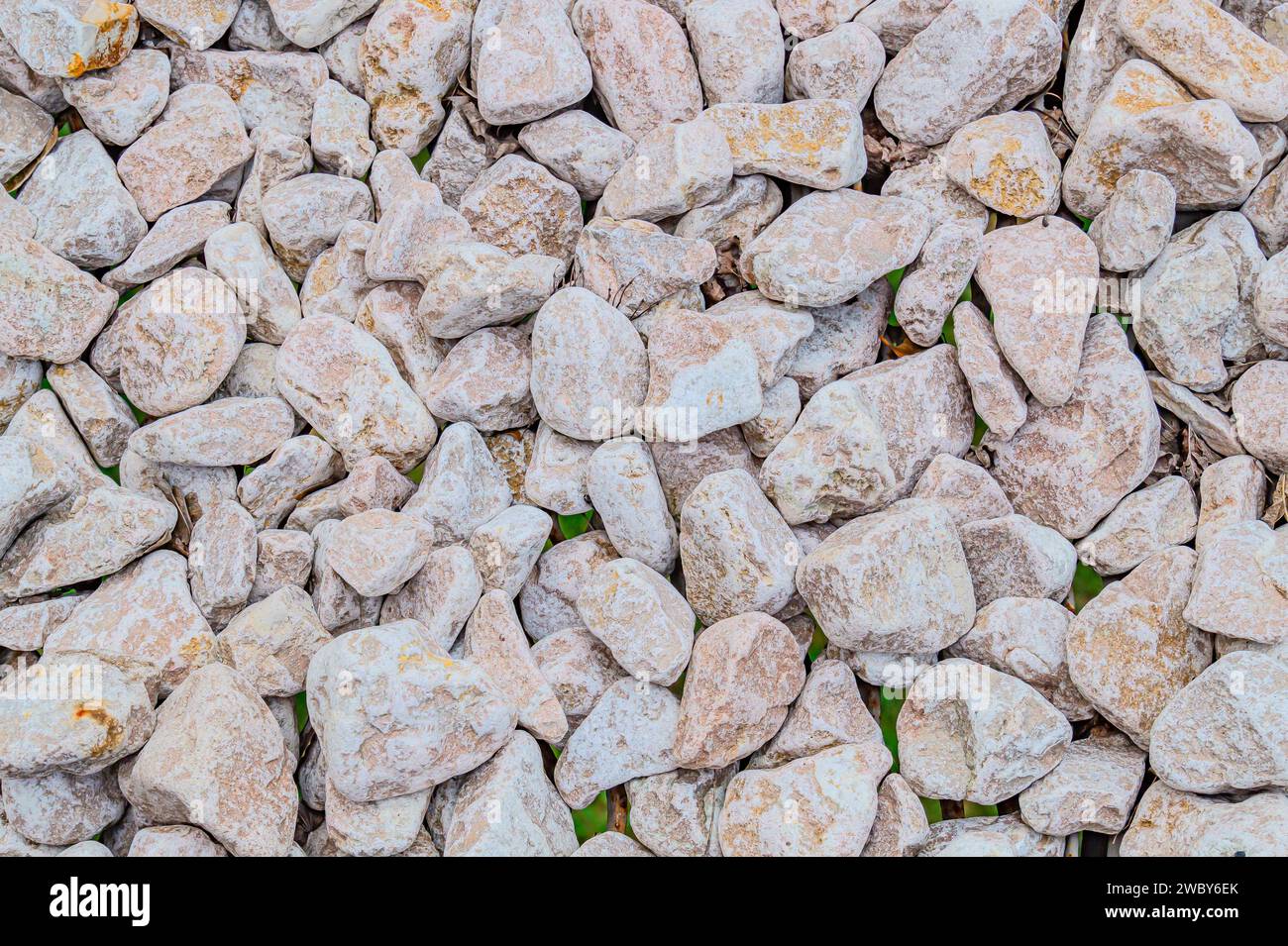 White pebbles stone texture and background. Natural background. Background of white sea stones ...