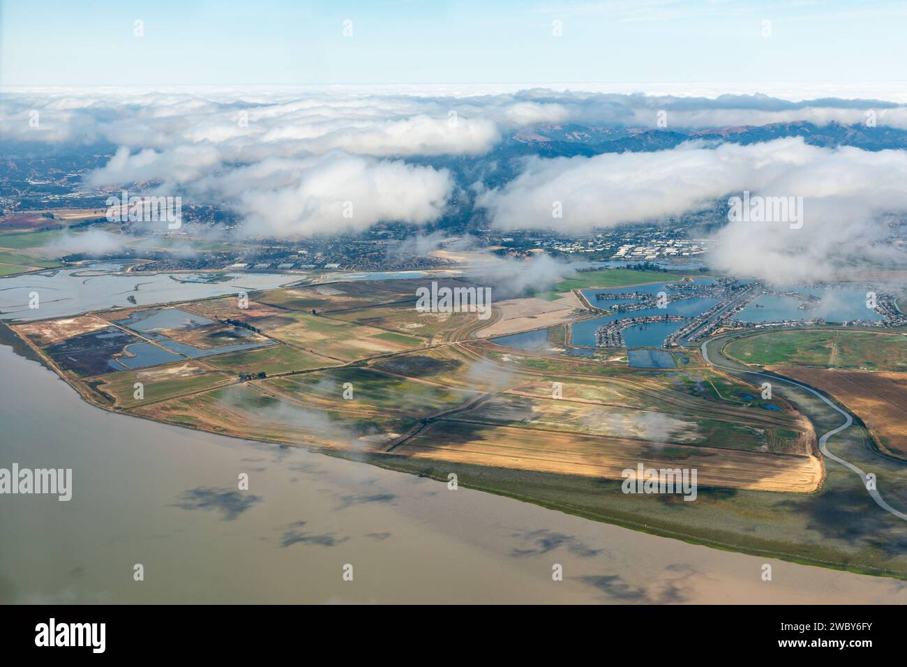 Aerial view of patterns of agricultural fields and the San Francisco ...