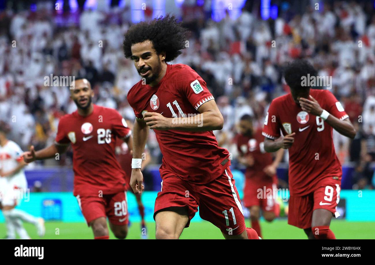 Akram Afif of Qatar reacts after scoring an opener during AFC Asian Cup ...