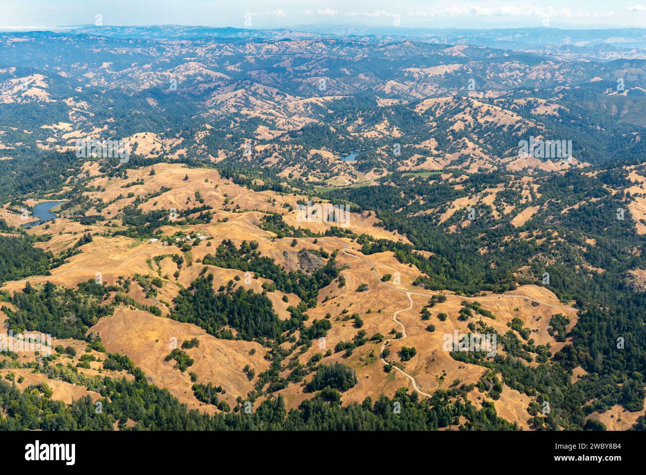 Aerial view of the colorful pattern and relief of mountain ridges and ...
