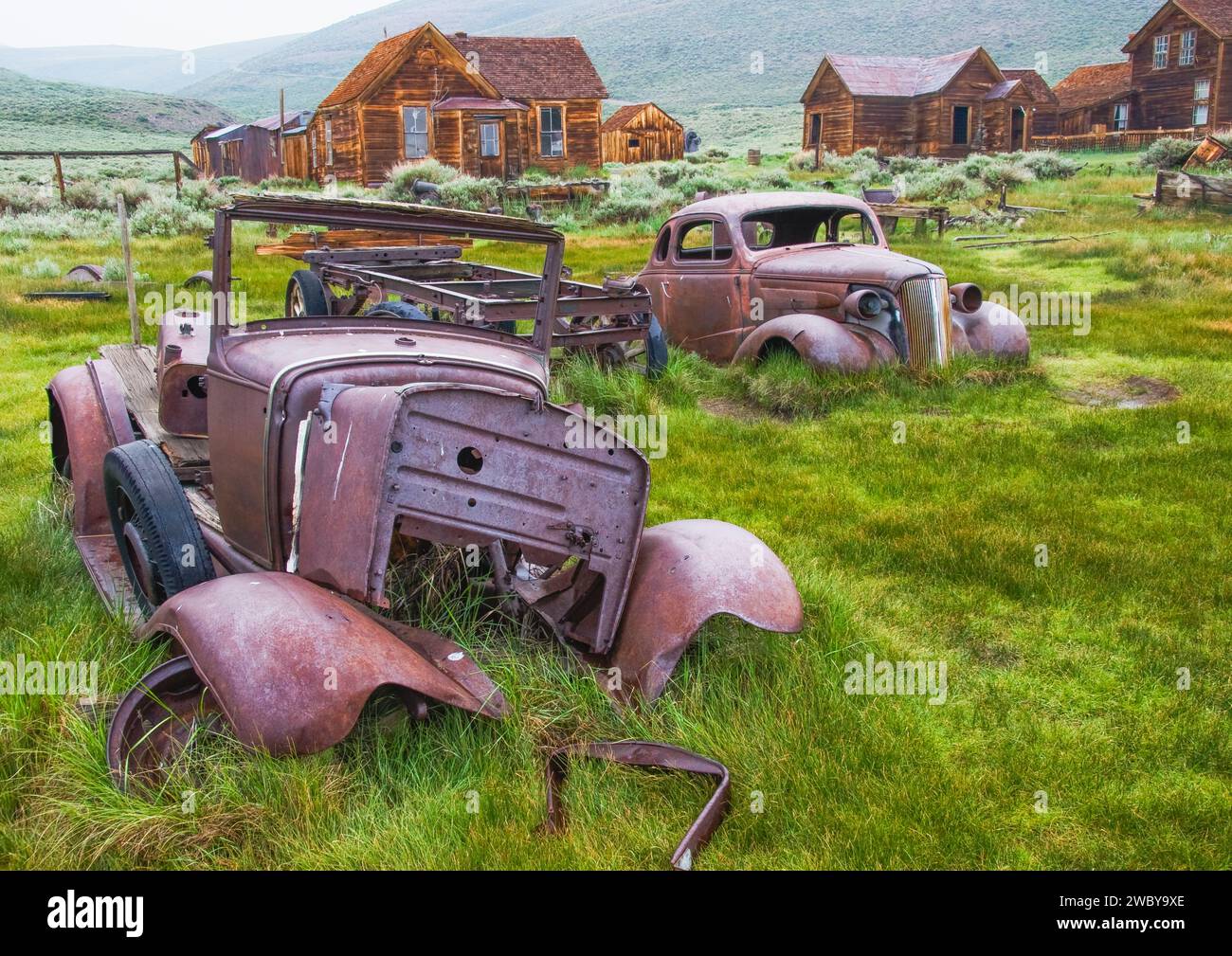 old rusty car wrecks in the abandoned western town of Bodie, California ...