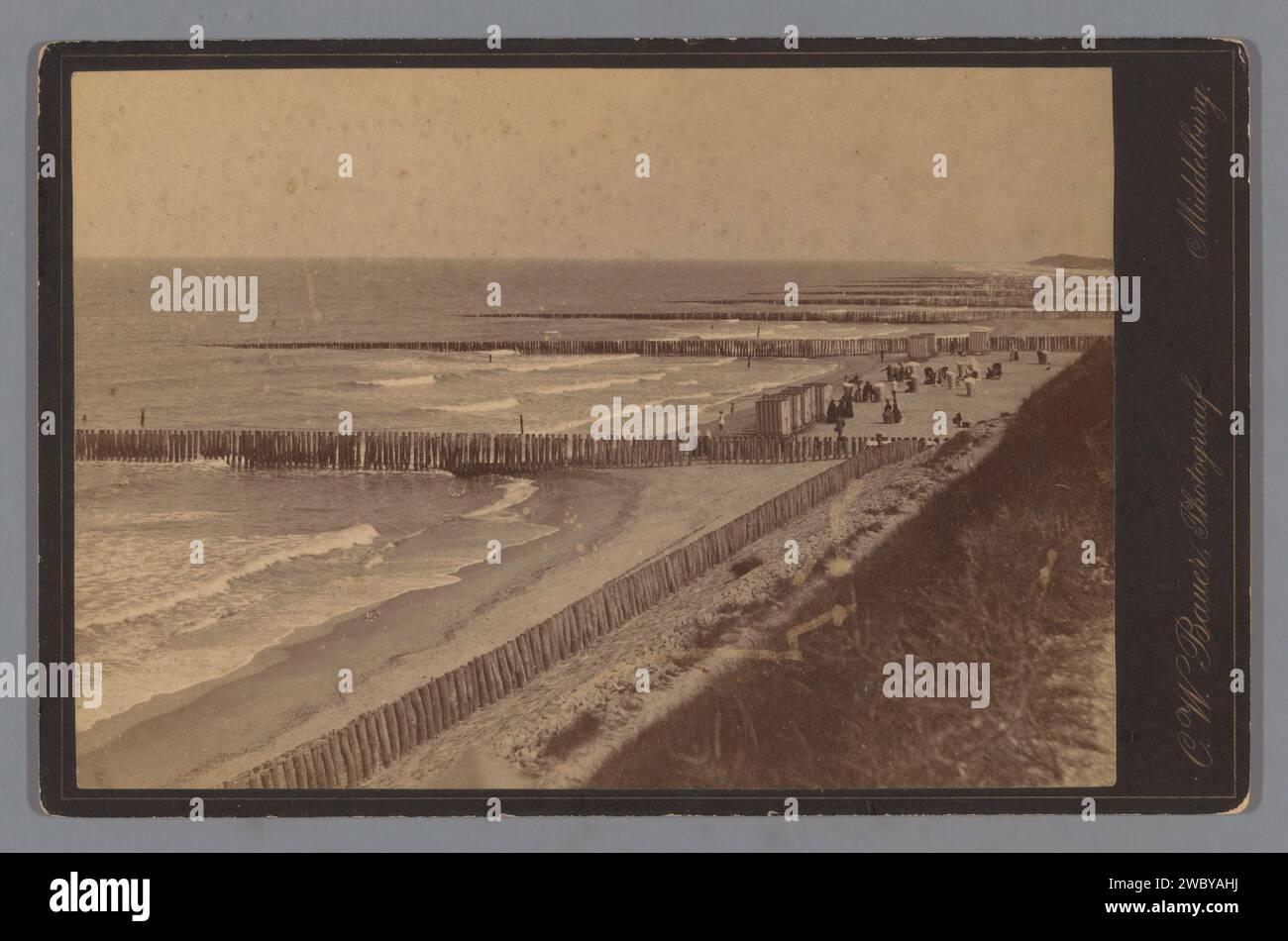 View of the beach of Zeeland with sea walls and changing rooms, Carl ...