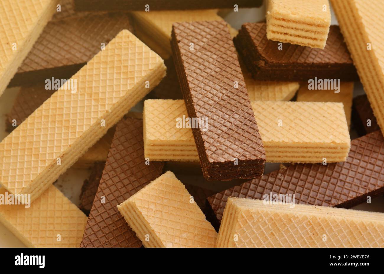 Stacked delicious chocolate wafers in large amount. Two different ...