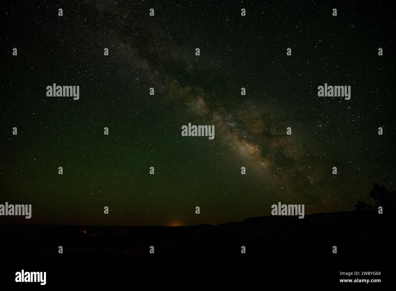Faint City Lights On The Horizon Over Bryce Canyon With The Milky Way ...