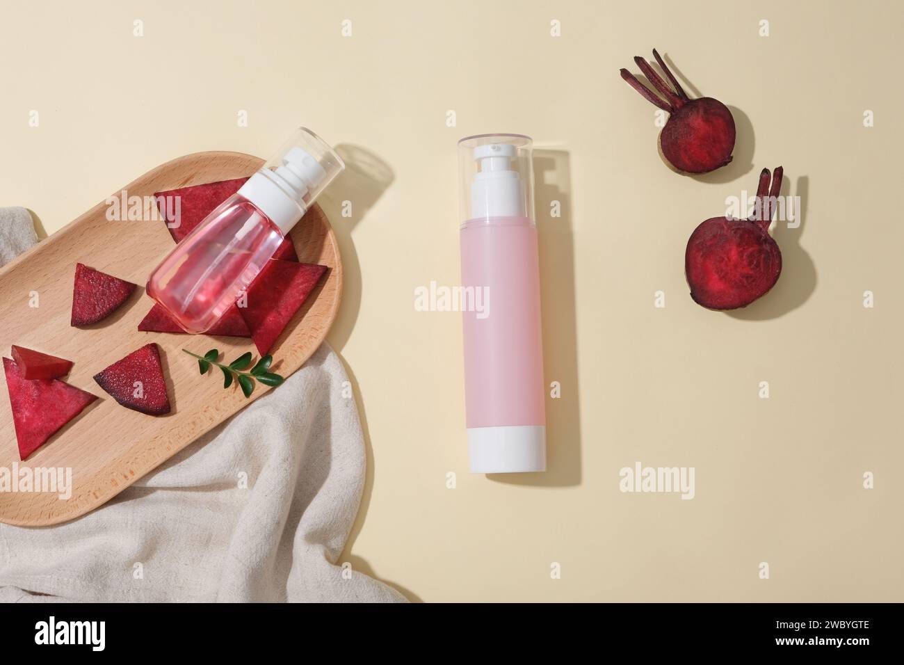 Pump bottle dispenser decorated with fresh beetroot slices. Mockup ...