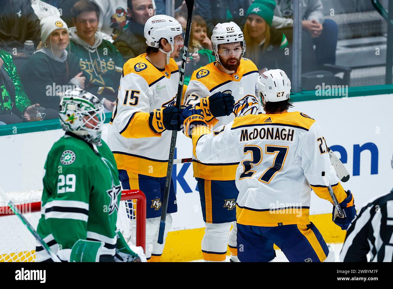 Nashville Predators forward Tommy Novak (82) is congratulated by ...