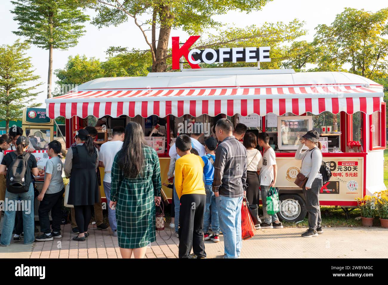 ZHONGSHAN GUANGDONG China-November 26,2023:people in front of KFC KCoffee Stock Photo - Alamy
