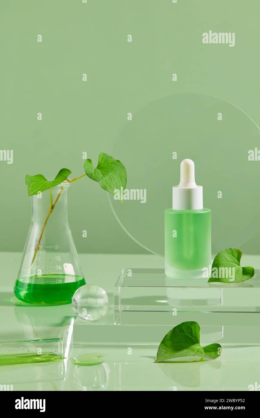 Conical Flask And Dropper Bottle Filled With Green Liquid Displayed