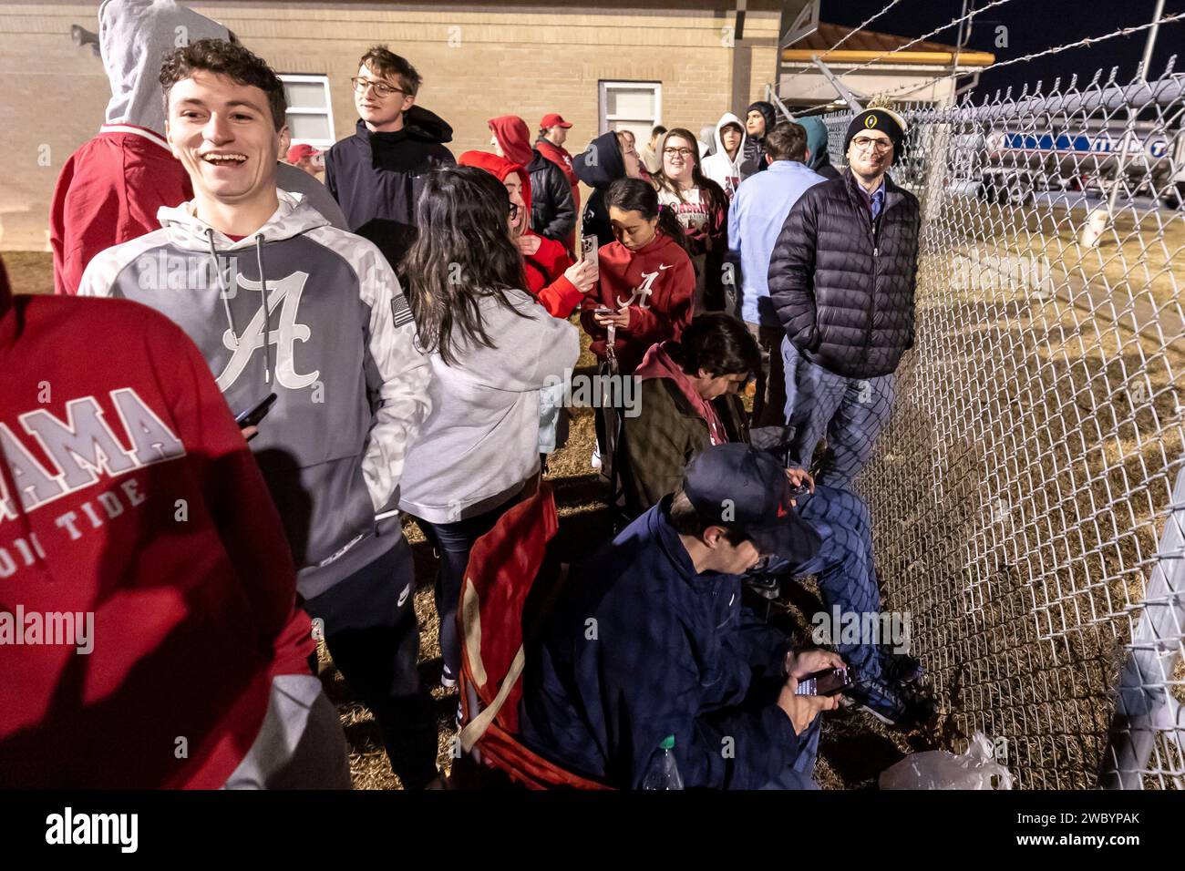 Fans line up at the fences to greet new Alabama football head coach ...