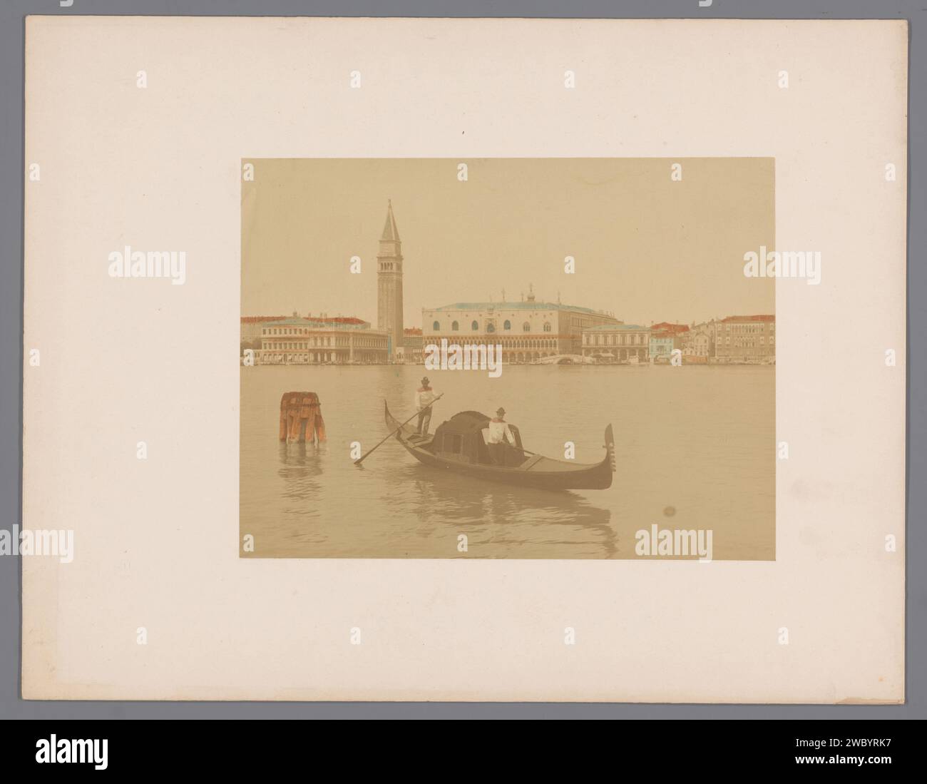 View of the Dog Palace and the Campanile and in the foreground a gondola in Venice, Italy ...