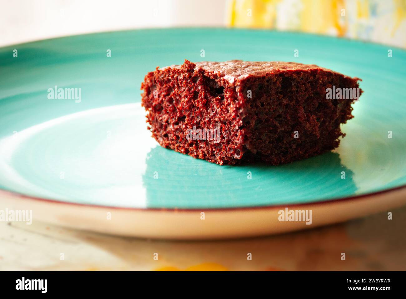 Small slice of chocolate cake on a plate Stock Photo - Alamy