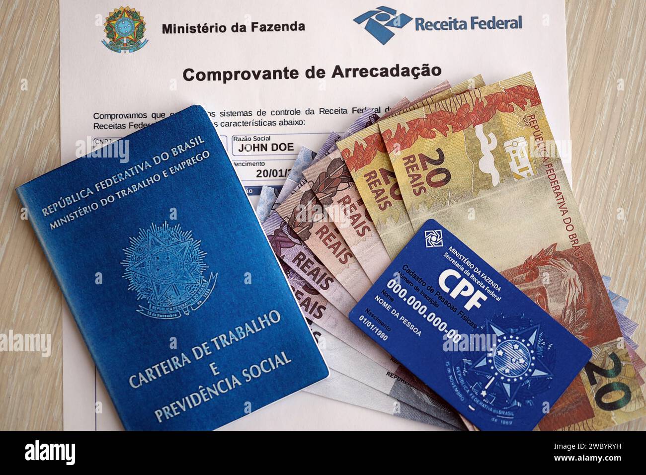 TERNOPIL, UKRAINE - JULY 7, 2023 Brazilian Work Permit document and ...