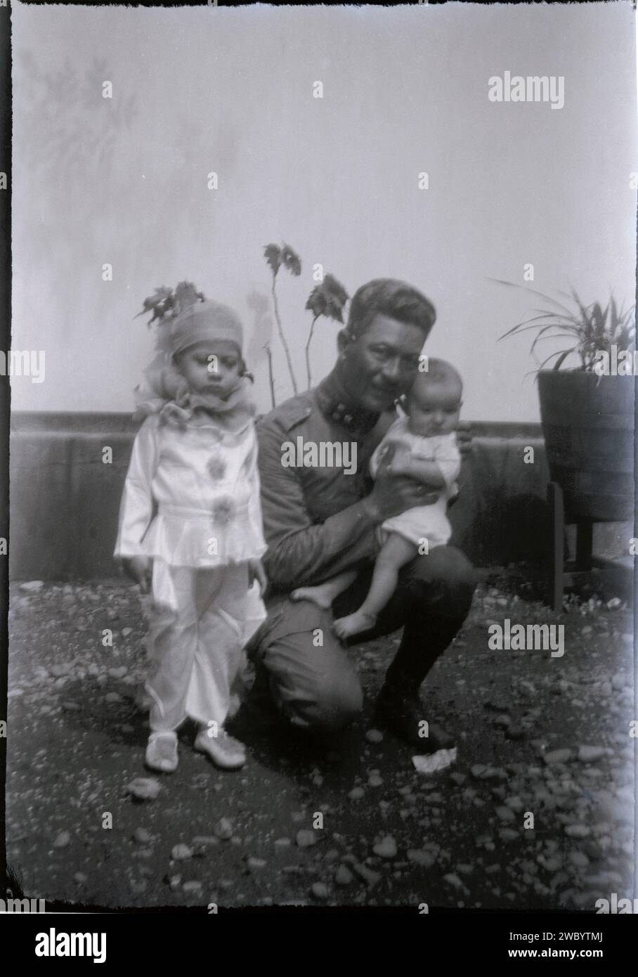 Man with two children, one dressed as Pierrot, 1928 Part of Kodak ...