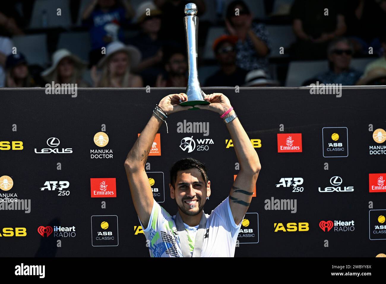 Alejandro Tabilo of Chile poses with his trophies after defeating Taro ...