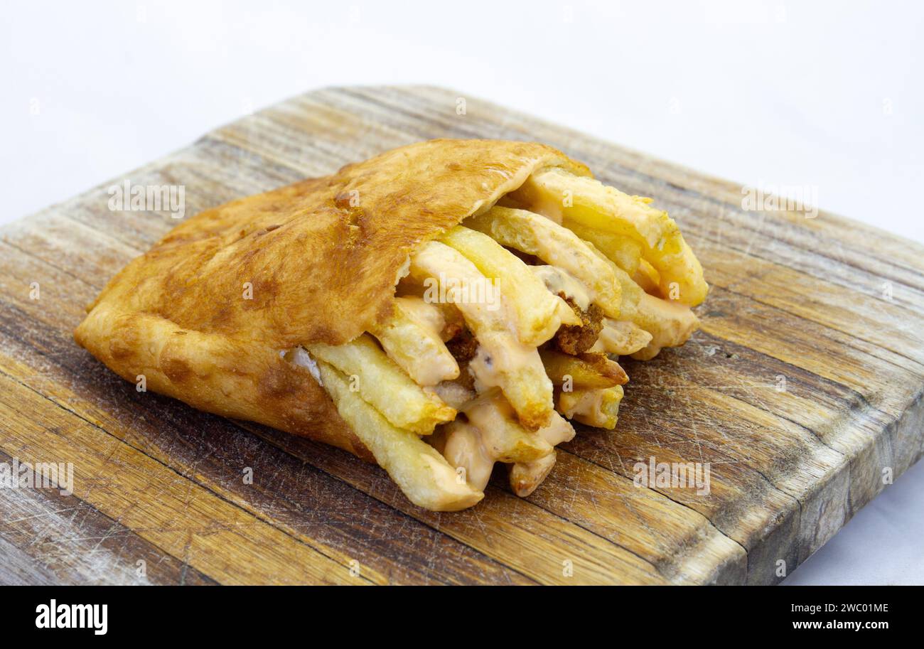 Traditional South African vetkoek kota a township food snack isolated ...