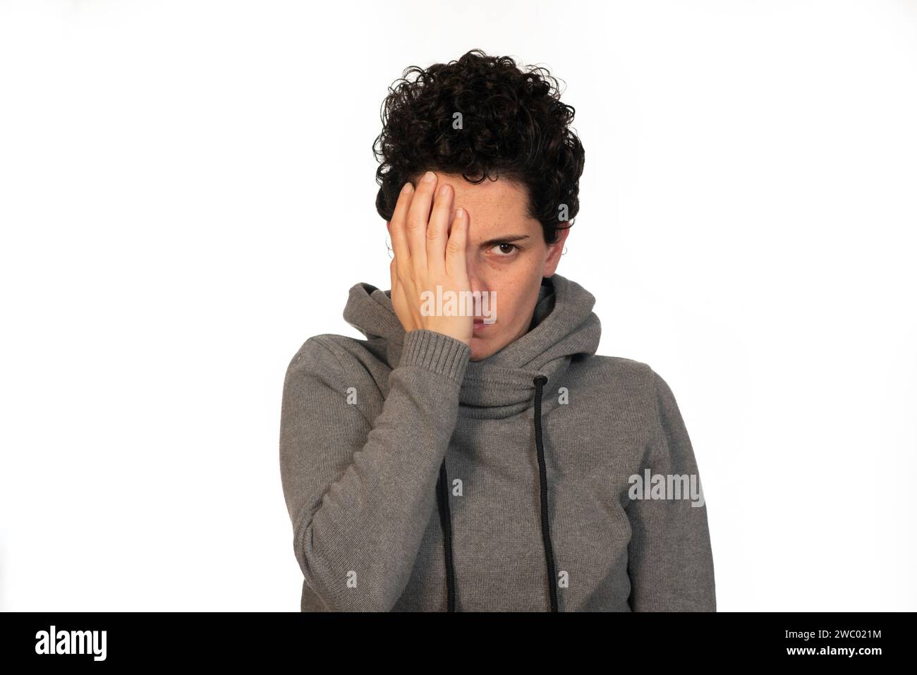 Hand covering eye hi-res stock photography and images - Alamy