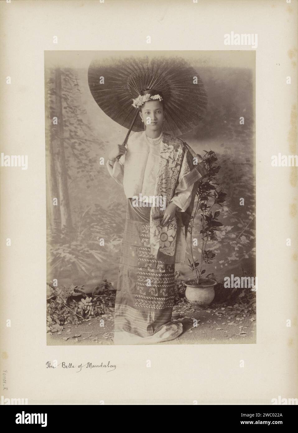 Portrait of a young women from Mandalay with an umbrella, Myanmar ...