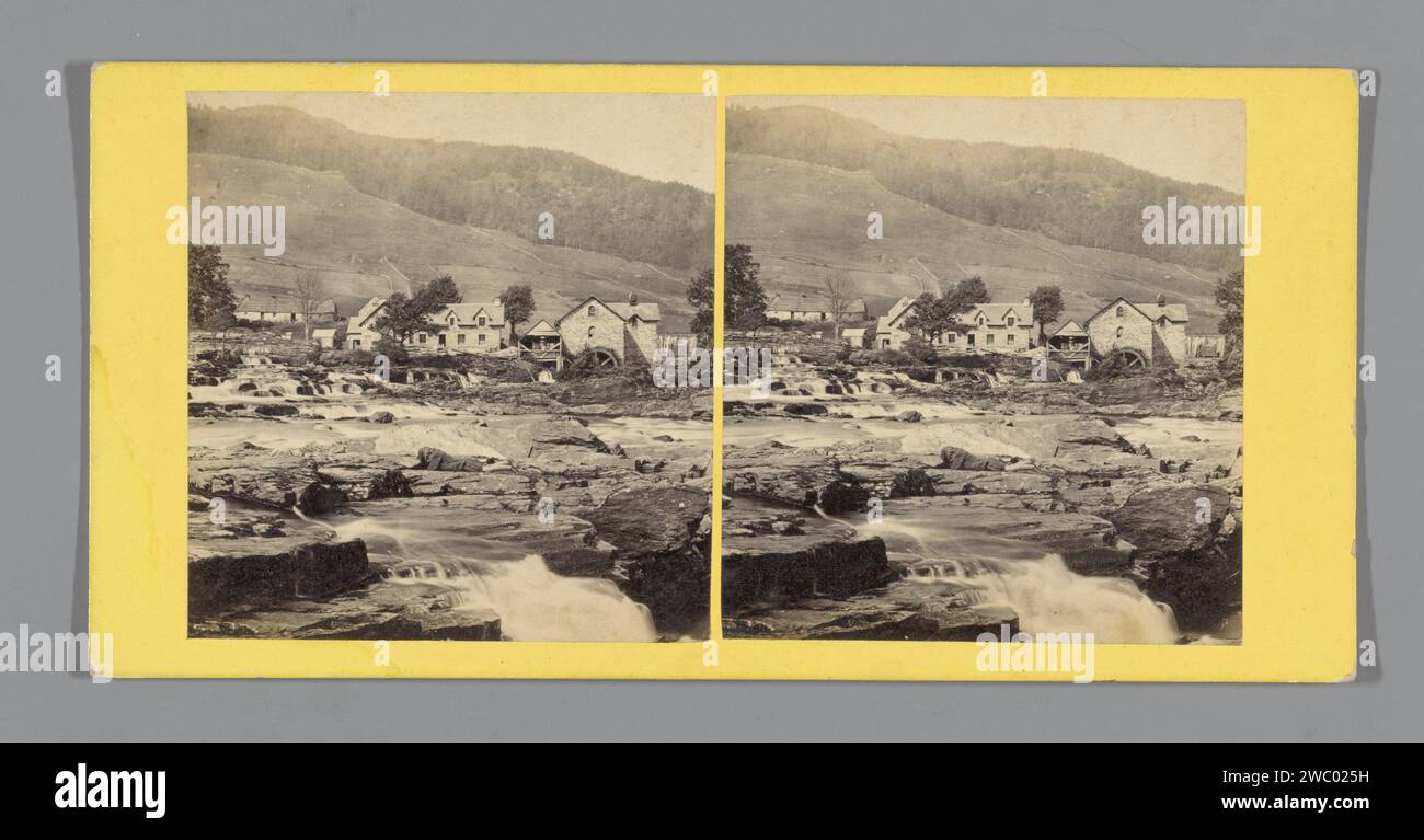 Waterfalls in the Dochart in Killin, with a watermill in the background ...