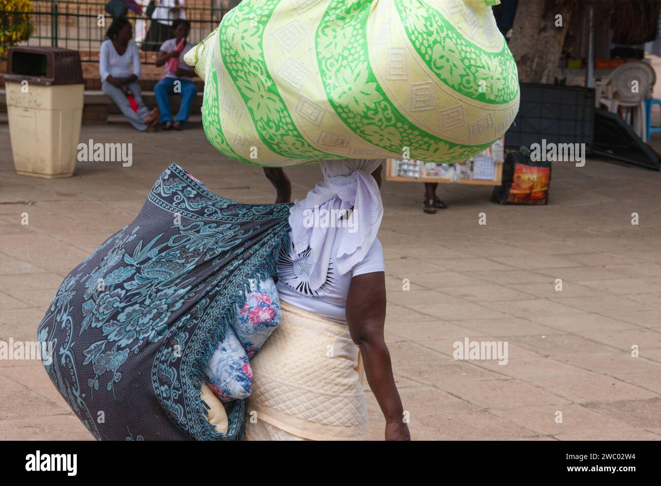 Gaborone, Botswana, 3.19.2010, african woman carry goods on the head ...