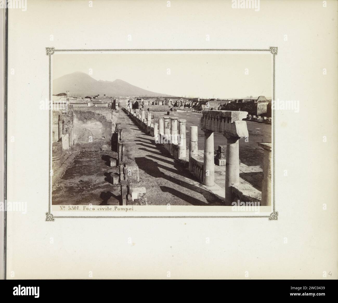 View of remnants of the forum in Pompeii with the Vesuvius in the ...
