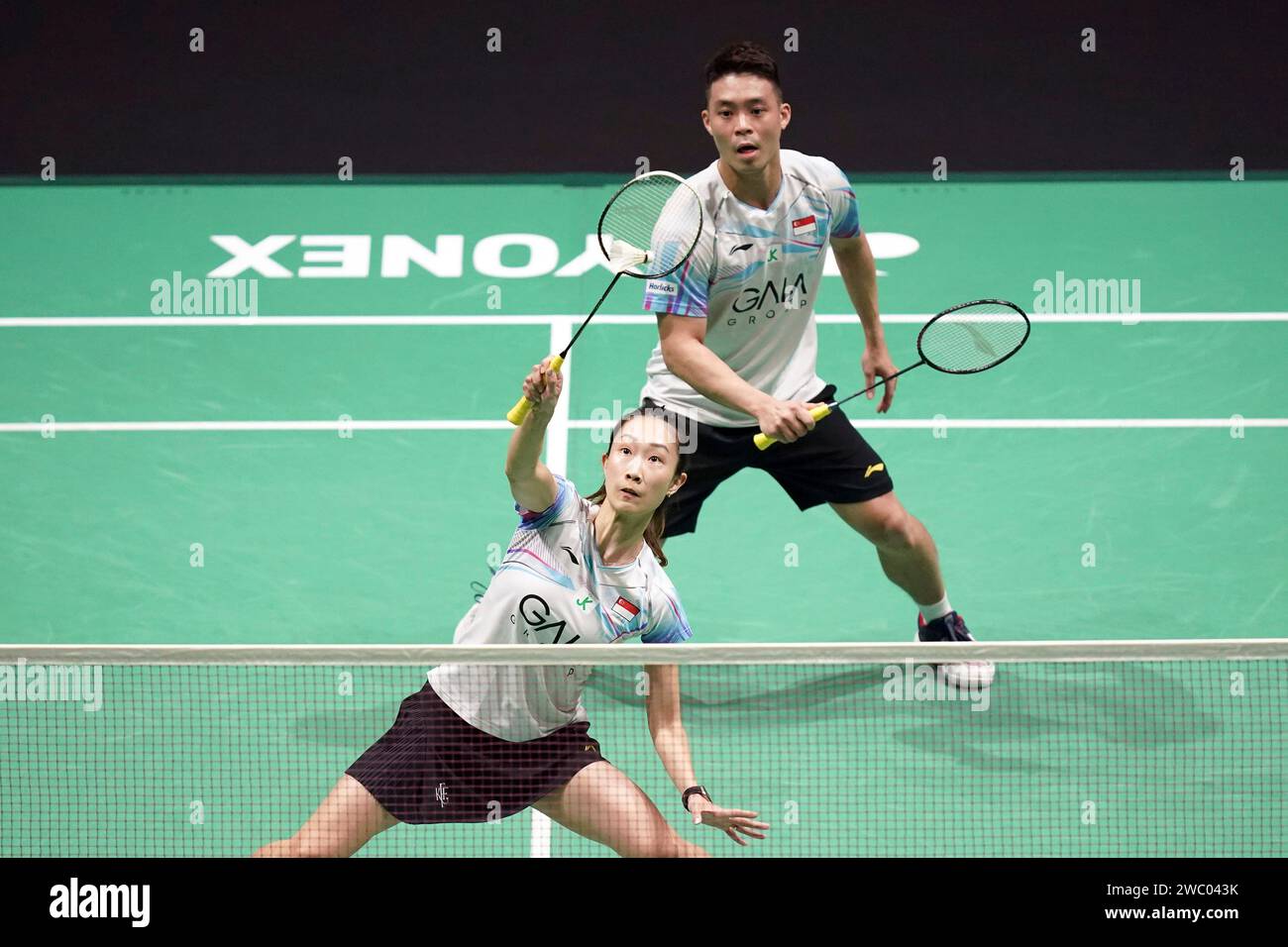 Singapore's Jessica Tan Wei Han, foreground, and Terry Hee Yong Kai ...