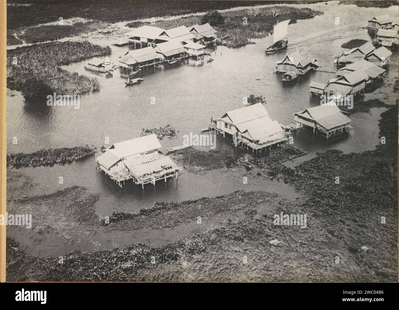 Pile houses in the water (presumably) in the Dutch East Indies, seen ...