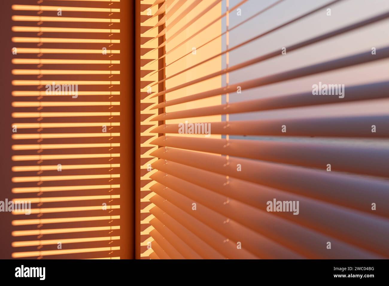 The setting sun shines through the closed horizontal blinds Stock Photo ...
