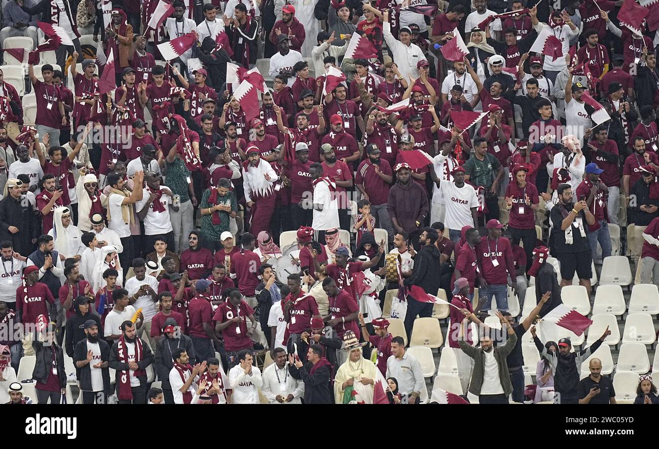 Qatar fans celebrate after their team beat Lebanon in the Asian Cup ...