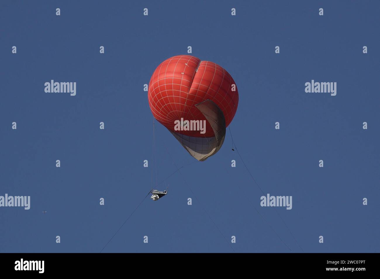An Israeli surveillance balloon flies near southern Gaza on January 10 ...