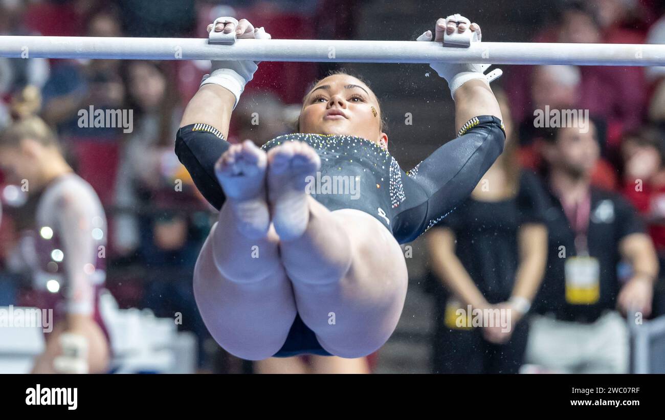 Missouri gymnast Kyra Burns scores 9.800 on the bars during an NCAA ...