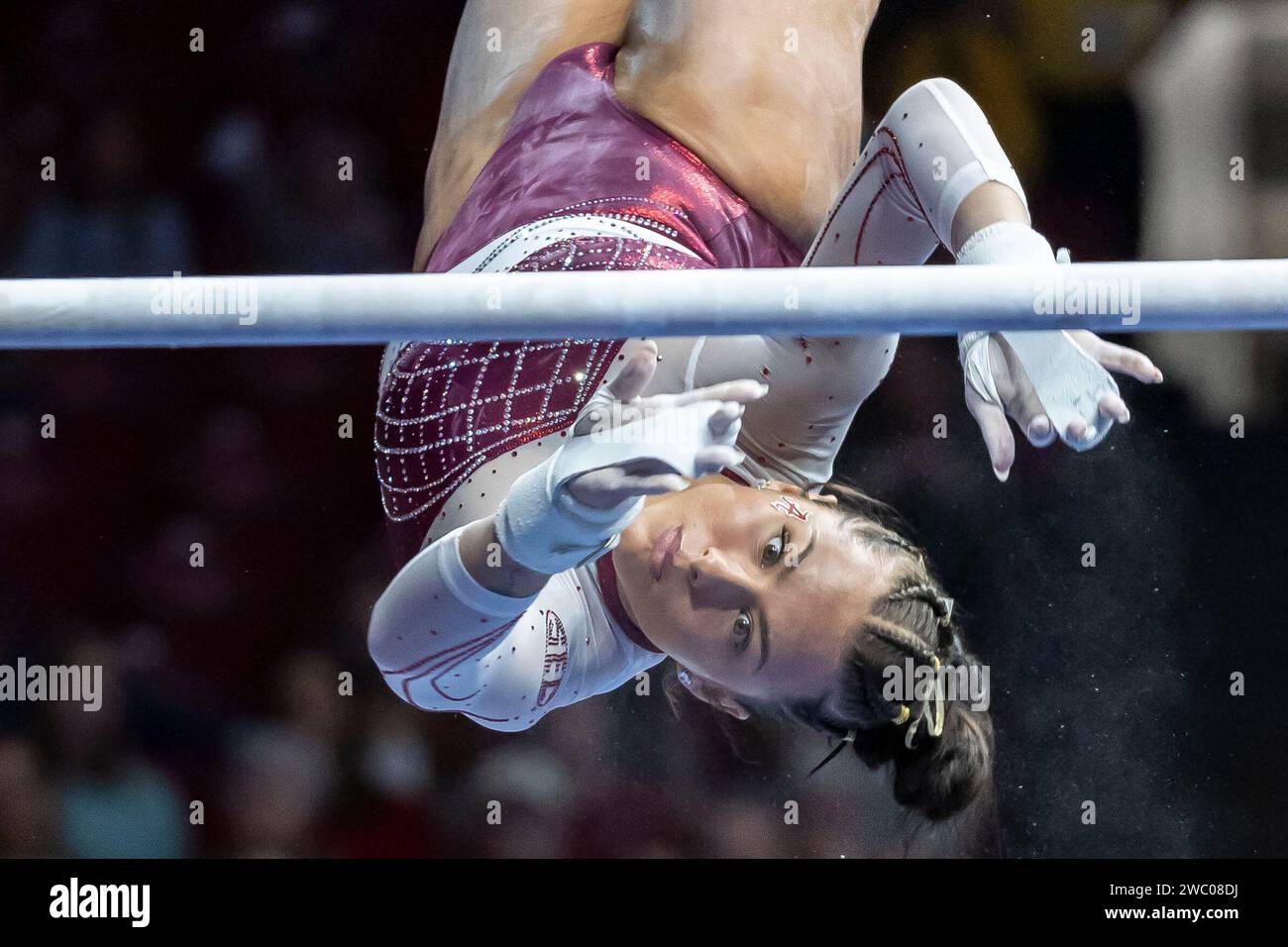 Alabama gymnast Cameron Machado scores 9.900 on the bars during an NCAA ...