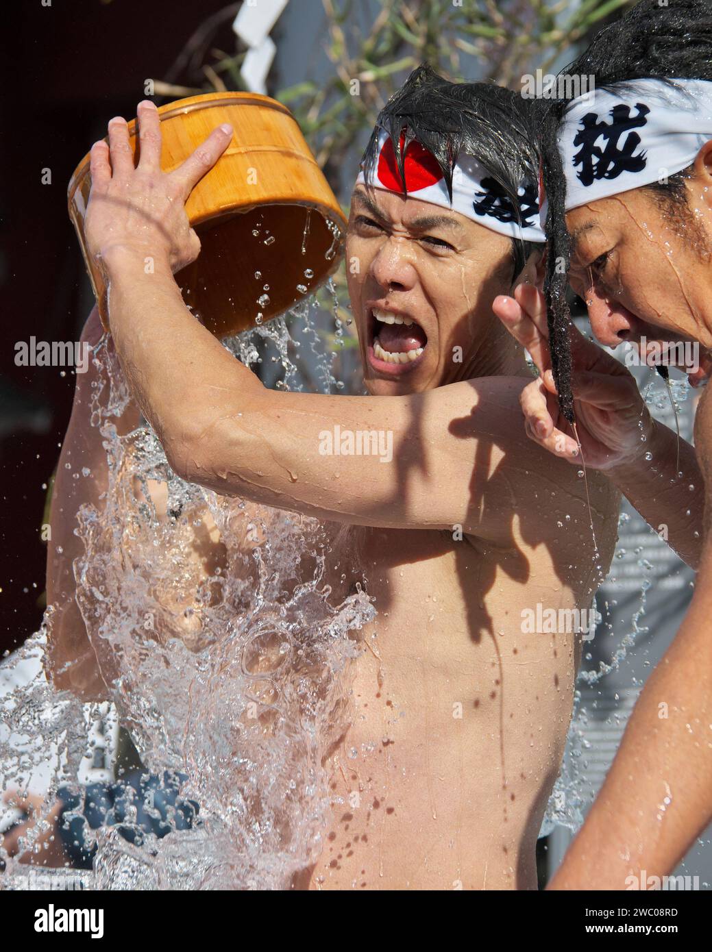 Tokyo, Japan. 13th Jan, 2024. Participants purify themselves by cold ...